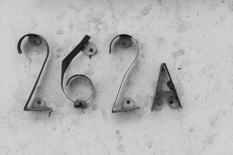 Street Number on White Wall Stock Image - Image of monochrome, wood ...