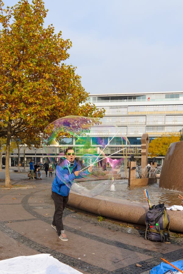 Street performance editorial photography. Image of square - 64139562