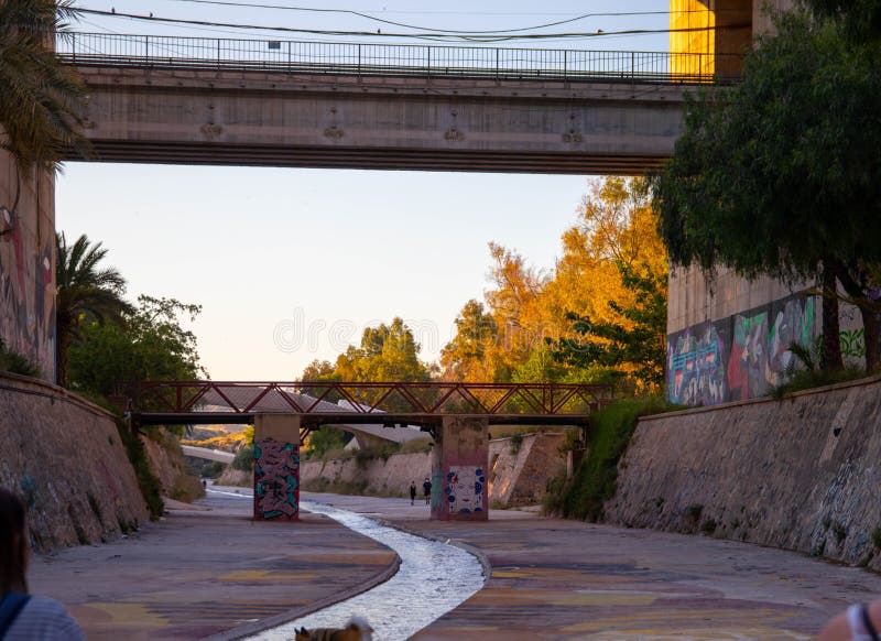 Street Photography Passing Under Bridges with Graffiti on the Ground ...