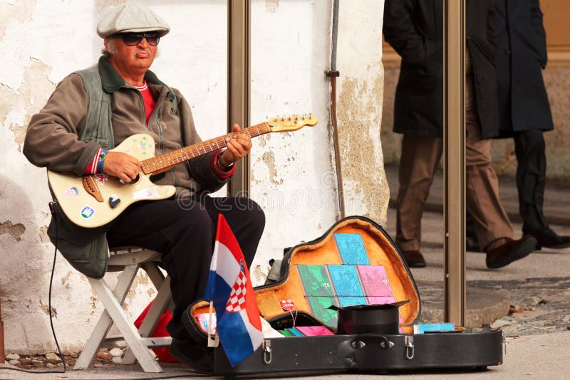 Street player editorial photo. Image of modern, glass - 16927881