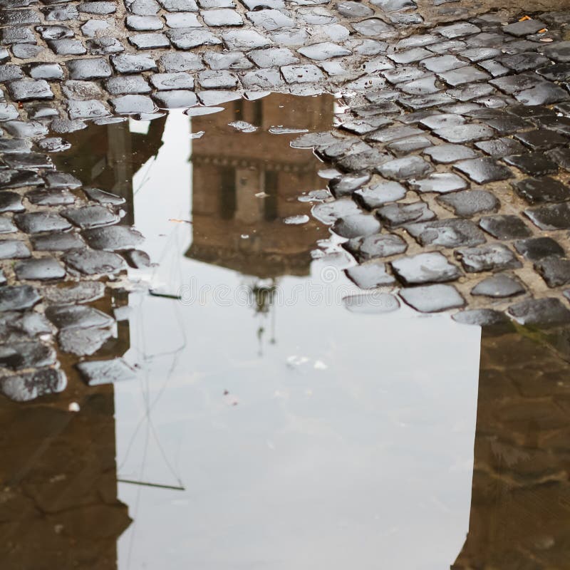 Street puddle stock photo. Image of pavement, building - 69361456