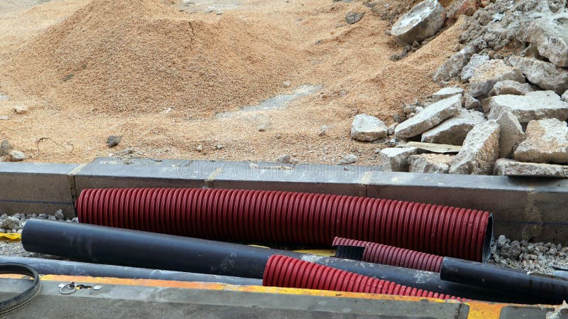 Street Repair in Progress with Building Materials and Pipes for ...