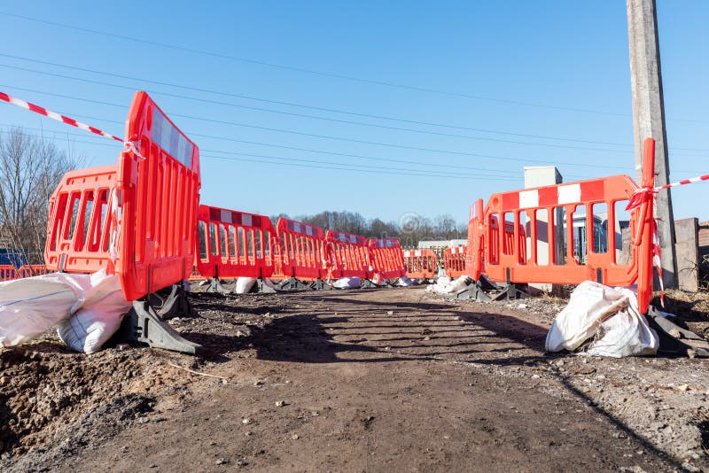 Street Repair Work with Red Boundary Fences on it Stock Image - Image ...