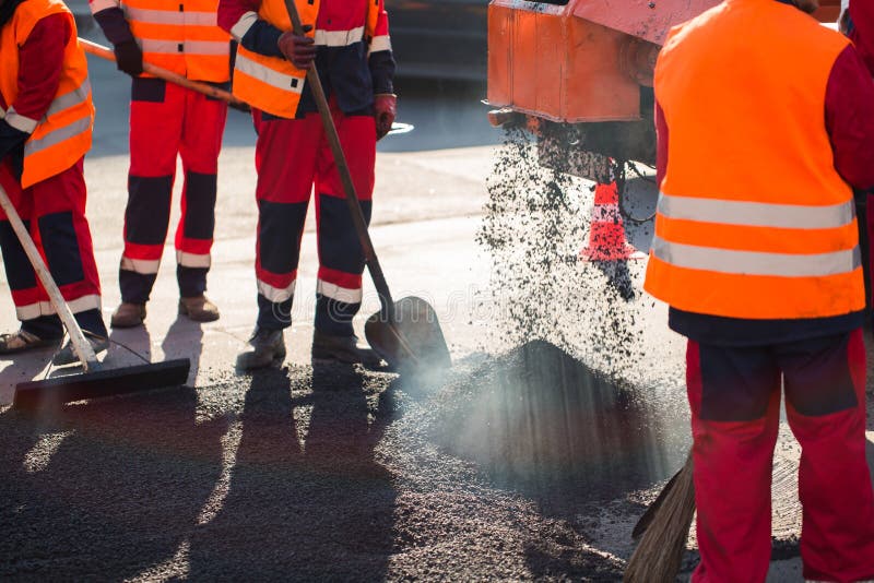 Street Resurfacing. Fresh Asphalt Construction. Bad Road. Stock Photo ...
