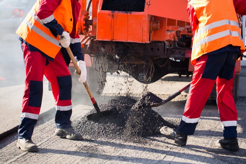 Street Resurfacing. Fresh Asphalt Construction. Bad Road. Stock Photo ...