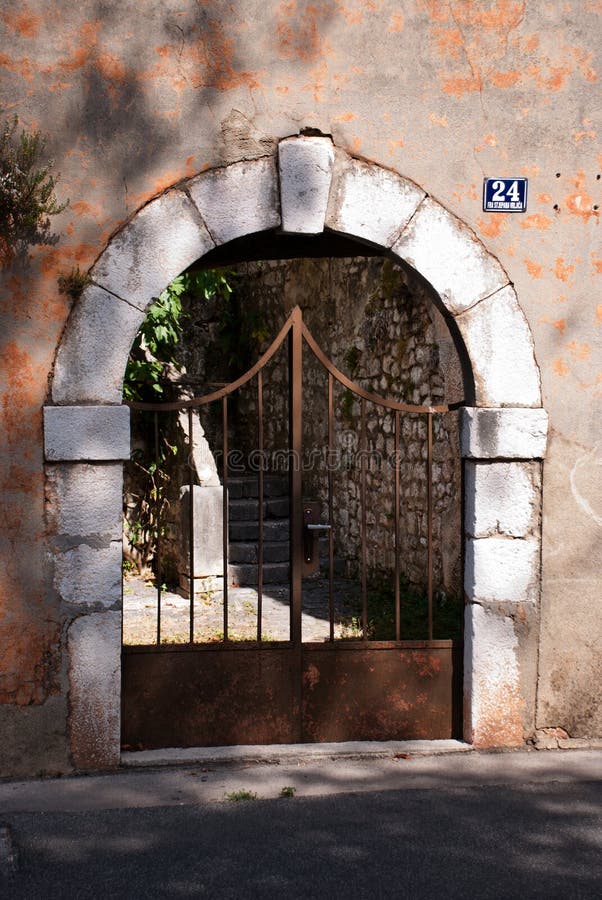 Street scene - gate stock photo. Image of street, imotski - 40560068