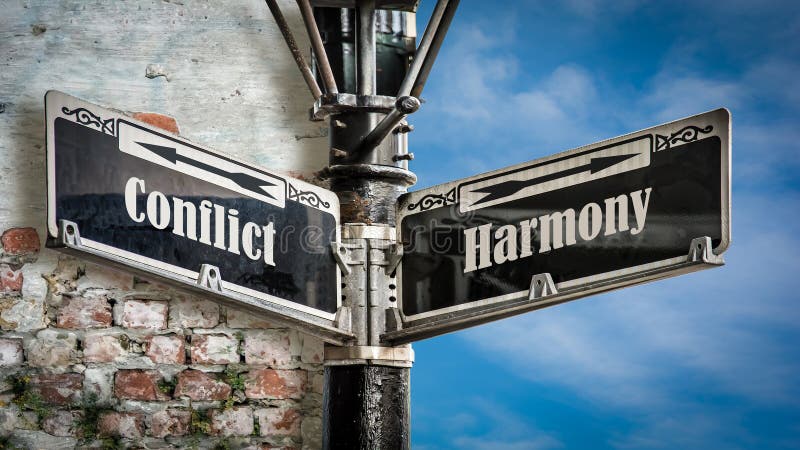 Street Sign Harmony Versus Conflict Stock Image - Image of conflicts ...