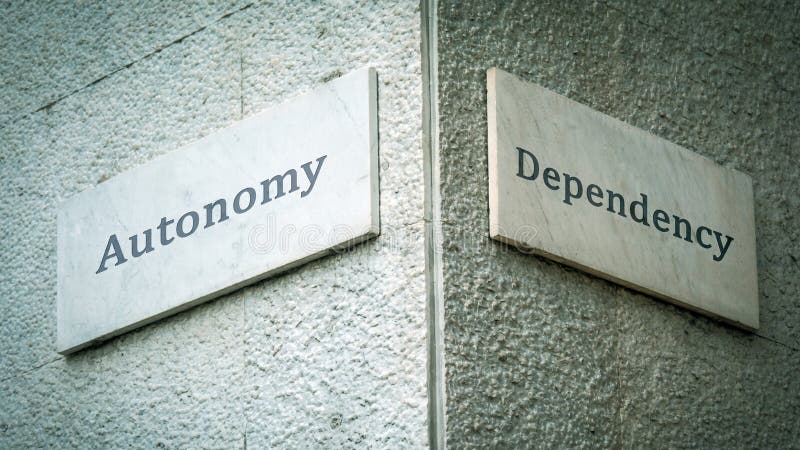 Street Sign To Autonomy Versus Dependency Stock Photo - Image of ...