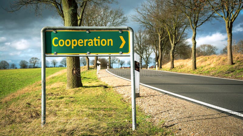 Street Sign to Cooperation stock image. Image of cooperative - 200142515