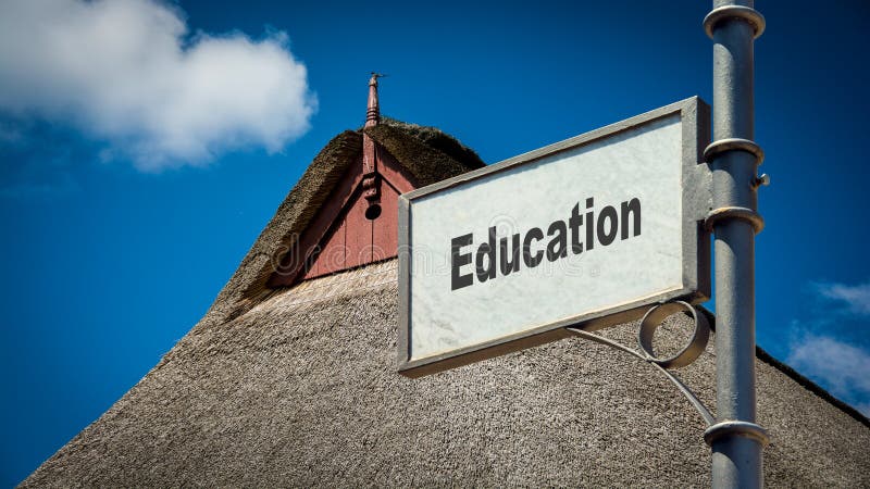 Street Sign to Education stock photo. Image of tutor - 220716942