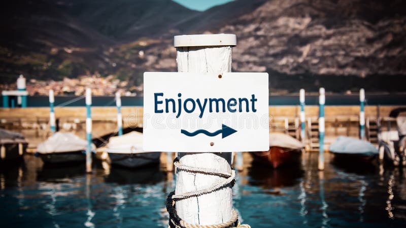 Street Sign to Enjoyment stock image. Image of leisure - 174656931