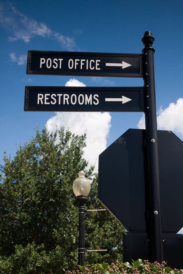 Standing Street Signs with Arrows To the Entrance Stock Image - Image ...