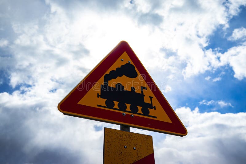 Street "Train Warning" Sign Against the Blue Sky Stock Image - Image of ...