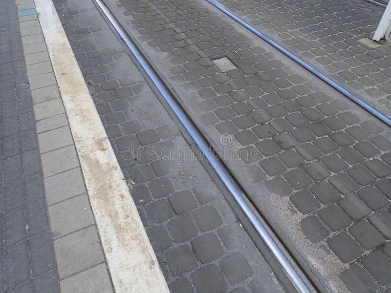 Street Tram Line Rails with Grey Pavement Stock Photo - Image of tram ...