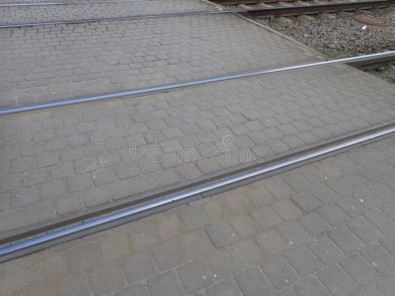 Street Tram Line Rails with Grey Pavement Stock Photo - Image of paving ...