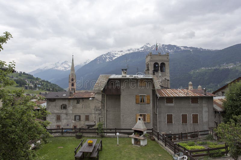 Street view in Bormio town editorial image. Image of mountains - 196348440