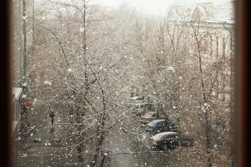 Street View from the Room on a Dull Cloudy Winter Day. the First Snow ...