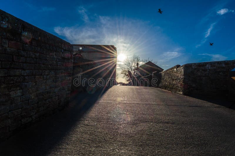 Street View with the Sun in Front Stock Image - Image of front, shadow ...