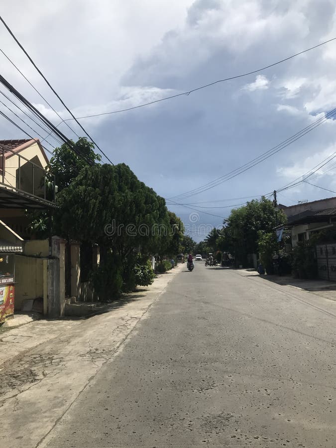 Street stock photo. Image of view, street, tree, cloud - 265221390