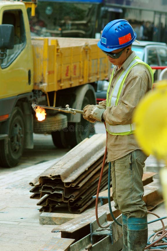 Street Worker Using Torch for Stock Photo - Image of china, torch: 2283472