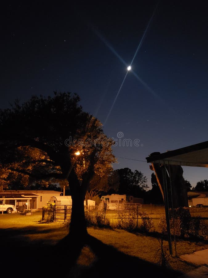 Moonlight, starlight stock image. Image of moon, streetlight - 135448279