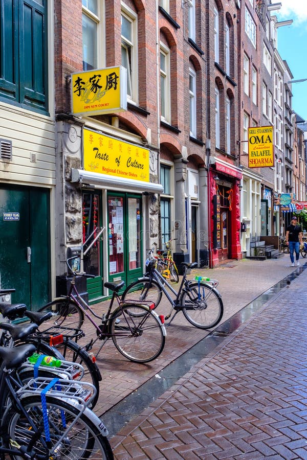 Streets of Amsterdam editorial stock photo. Image of walk - 97736953