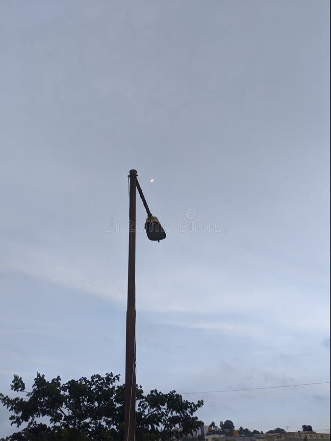Streets Light and the Moon in the Morning Lights Stock Image - Image of ...