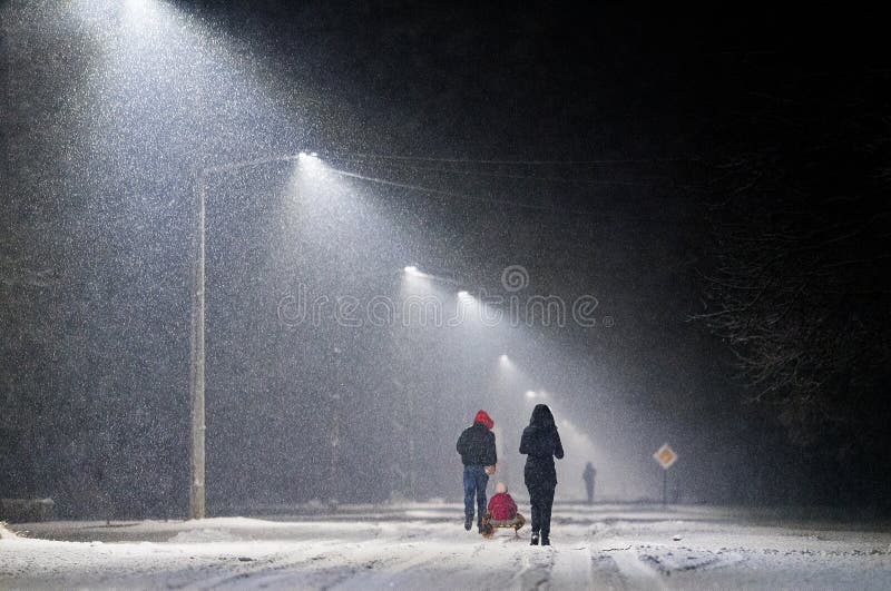 Streets in snowy evening stock image. Image of diminishing - 83578901