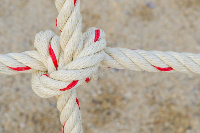A Strength Beige and Red Rope Stock Image - Image of draw, ship: 72380391