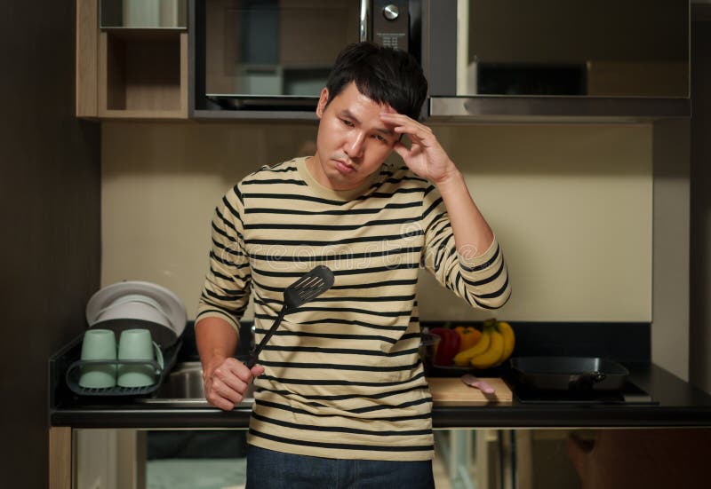 Stress man in kitchen room stock image. Image of unhappy - 328980905