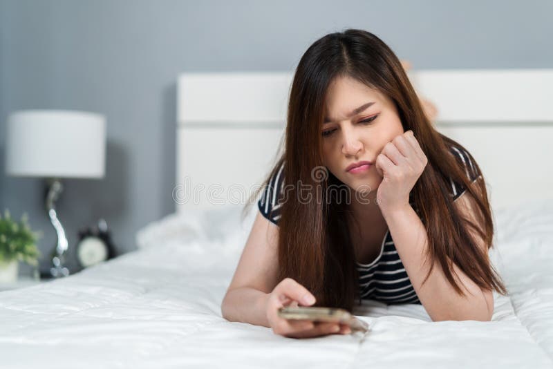 Stress Woman Using Smartphone on Bed Stock Image - Image of media ...