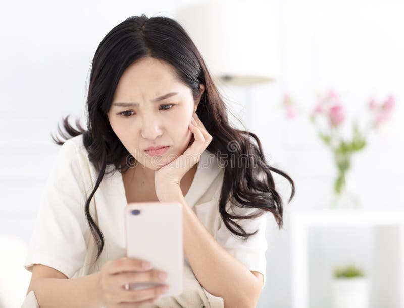 Young Woman Watching the Smart Phone Stock Photo - Image of female ...