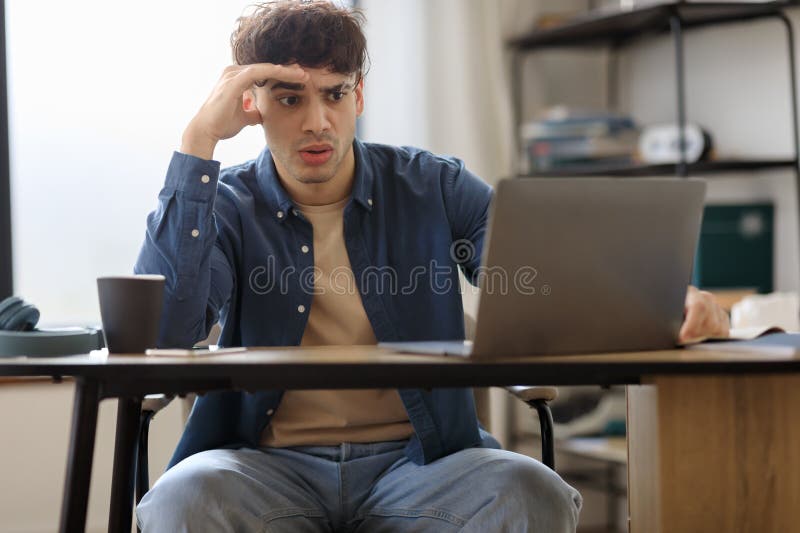 Stressed Arabic Man Using Laptop Sitting at Desk in Office Stock Image ...