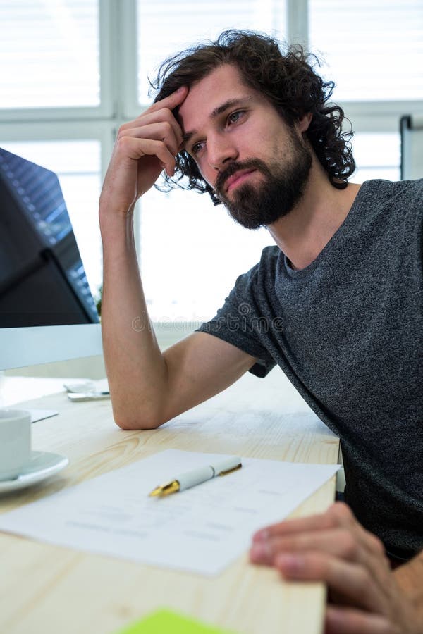 Stressed Business Executive at His Desk Stock Photo - Image of ...