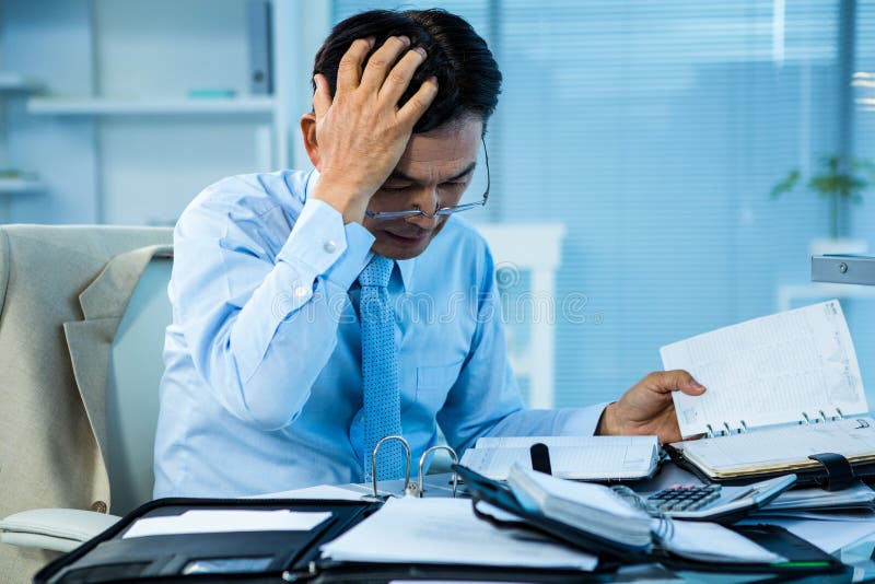 Stressed Businessman with a Big Amount of Work Stock Photo - Image of ...