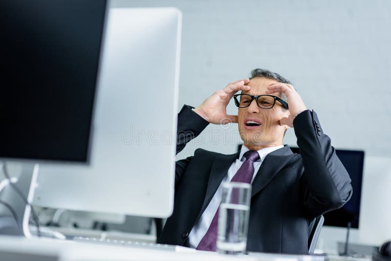 Stressed Businessman Looking at Computer Screen Stock Photo - Image of ...