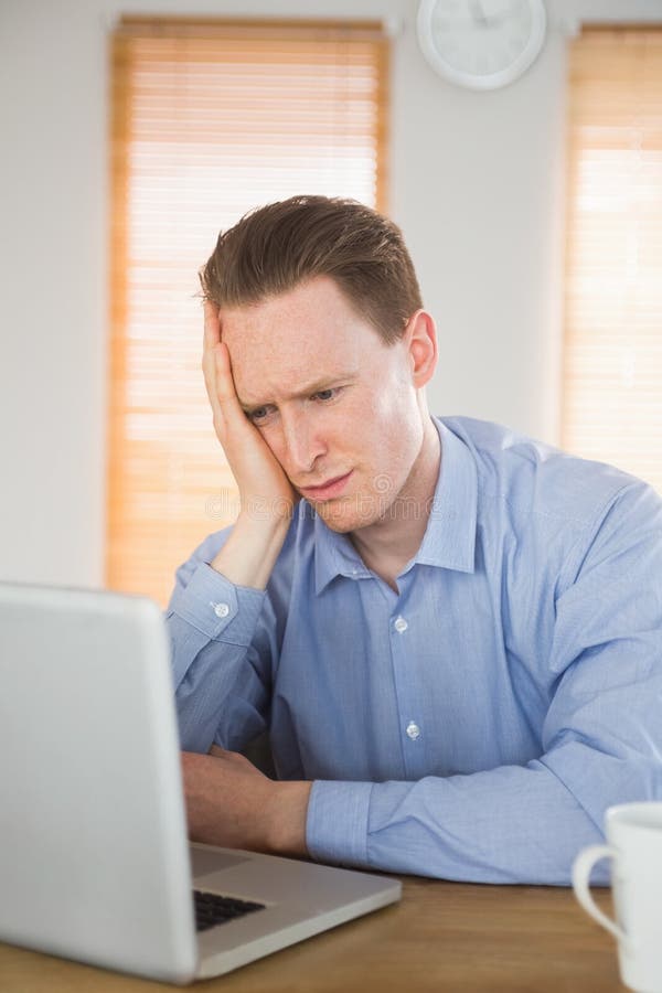 Stressed Businessman Looking at His Laptop Stock Photo - Image of ...