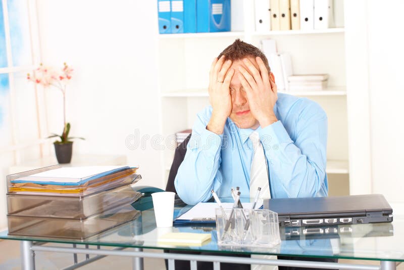 Stressed Businessman Sitting at Desk Stock Photo - Image of anxiety ...