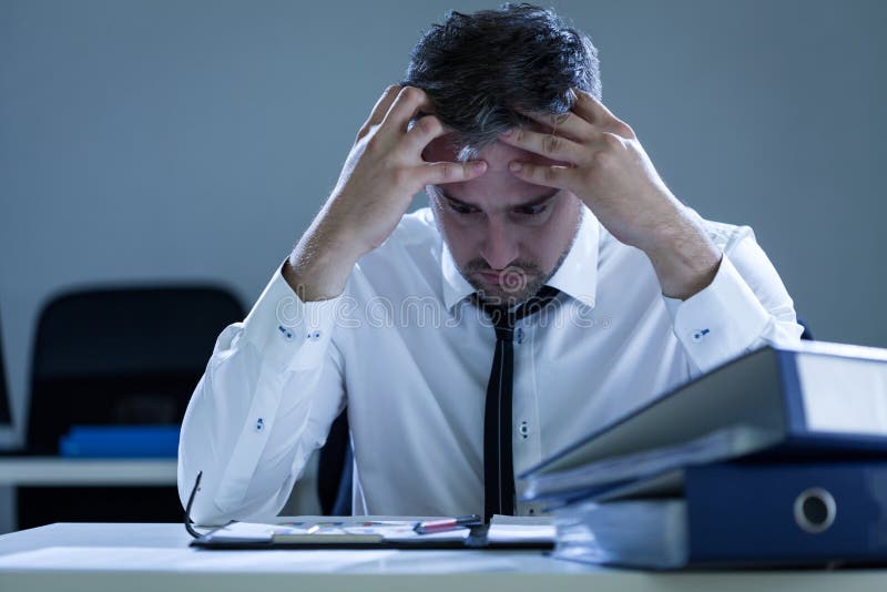 Stressed Businessman Sitting at Desk Stock Photo - Image of overload ...
