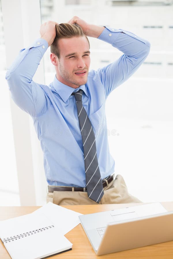 Stressed Businessman Sitting at His Desk Stock Photo - Image of ...