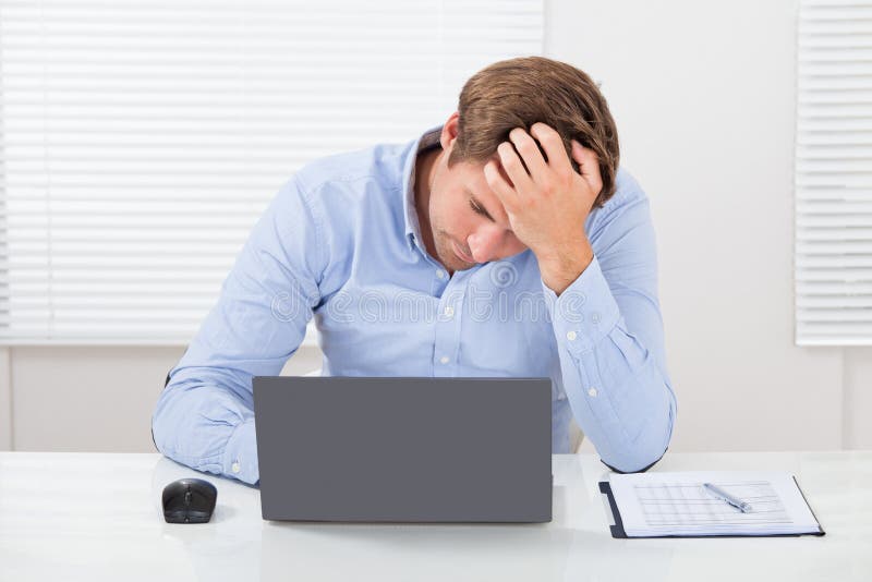 Stressed Businessman Using Laptop in Office Stock Image - Image of ...