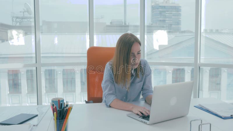 Stressed Businesswoman Typing on Her Laptop. Stock Footage - Video of ...