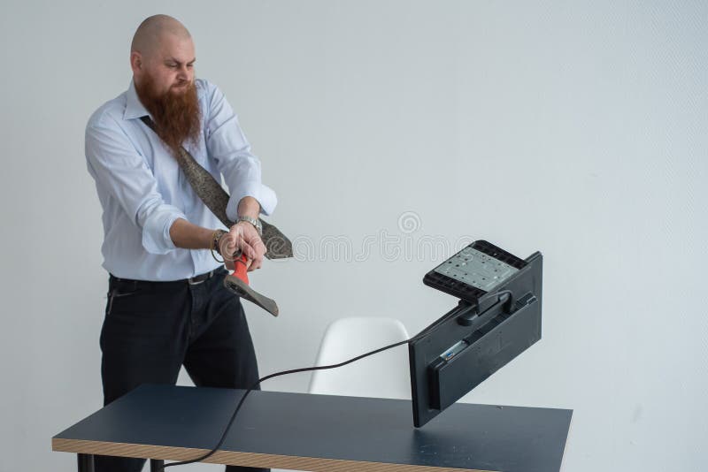 Stressed Crazy Businessman Smashing His Computer in Office Using Ax ...