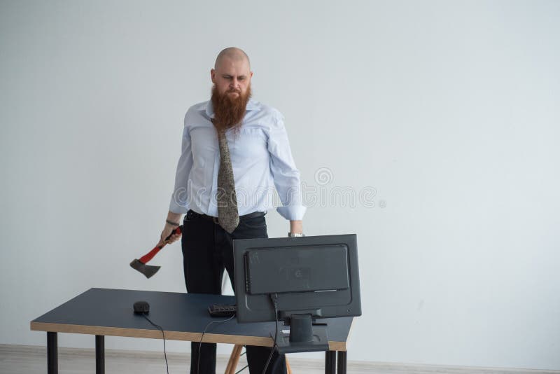 Stressed Crazy Businessman Smashing His Computer in Office Using Ax ...