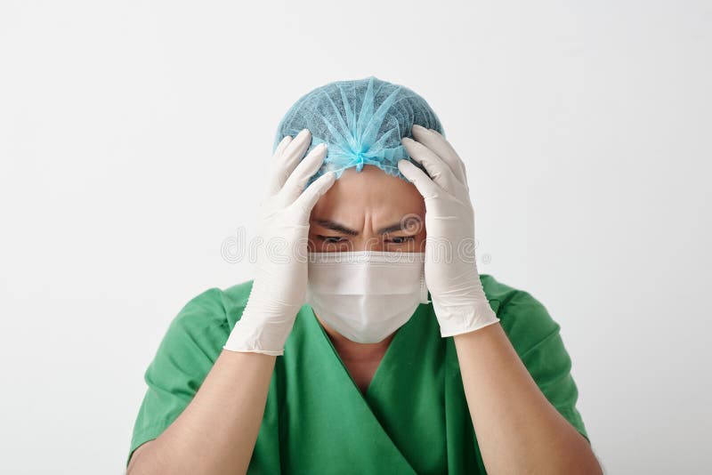 Stressed Desperate Surgeon stock image. Image of negative - 235768285
