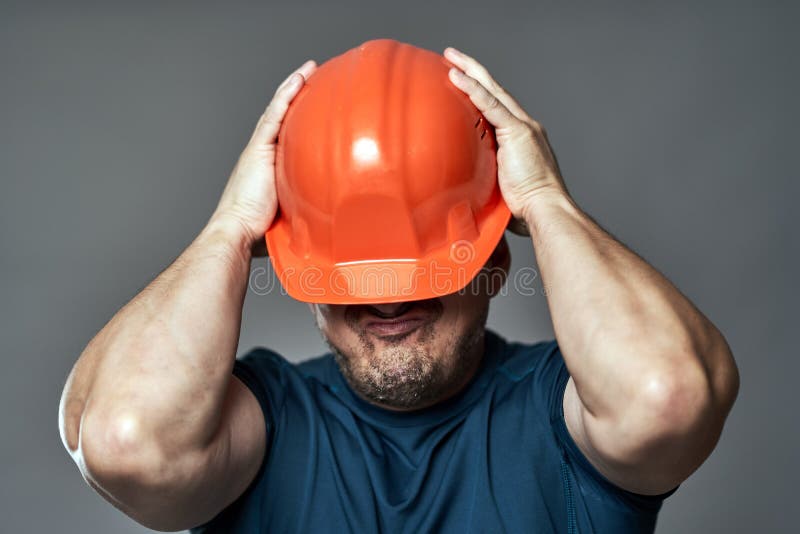 Stressed Engineer Closed Face by Two Hands Stock Photo - Image of male ...