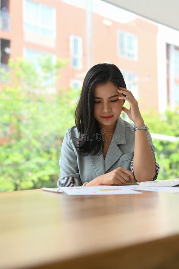 Stressed Female Office Worker Having Trouble with Financial Problems or ...