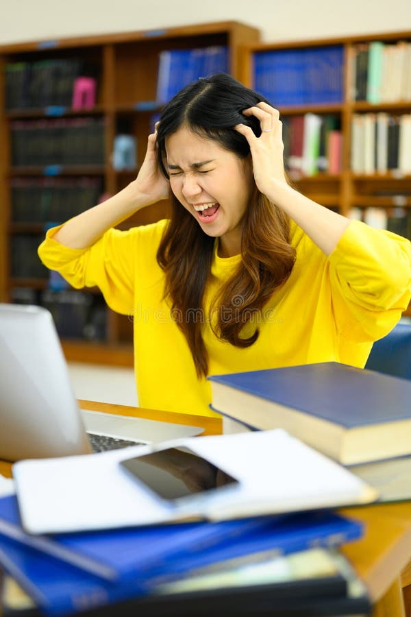 Stressed Female Student Sitting in Front of the Laptop, Having Serious ...