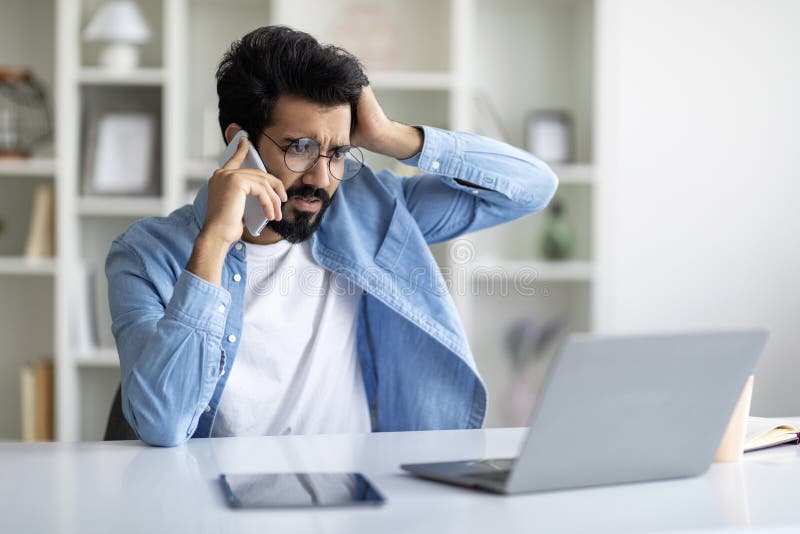 Stressed Indian Male Having Problems with Computer while Working at ...