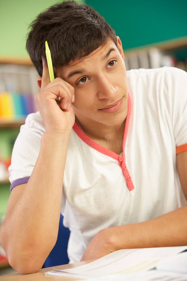 Stressed Male Teenage Student Studying Stock Image - Image of pupil ...